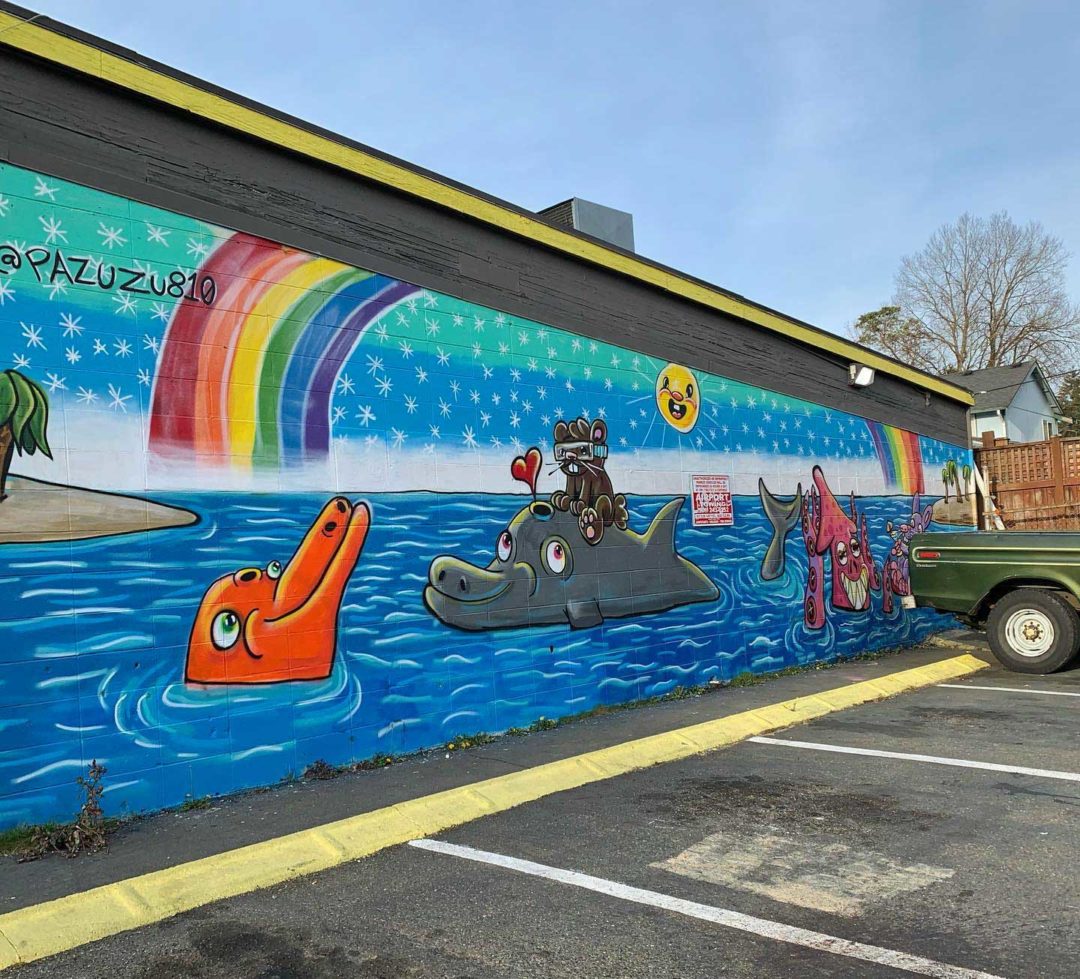 New mural painted by Paz on side of Rainbow Mini Mart | The White ...